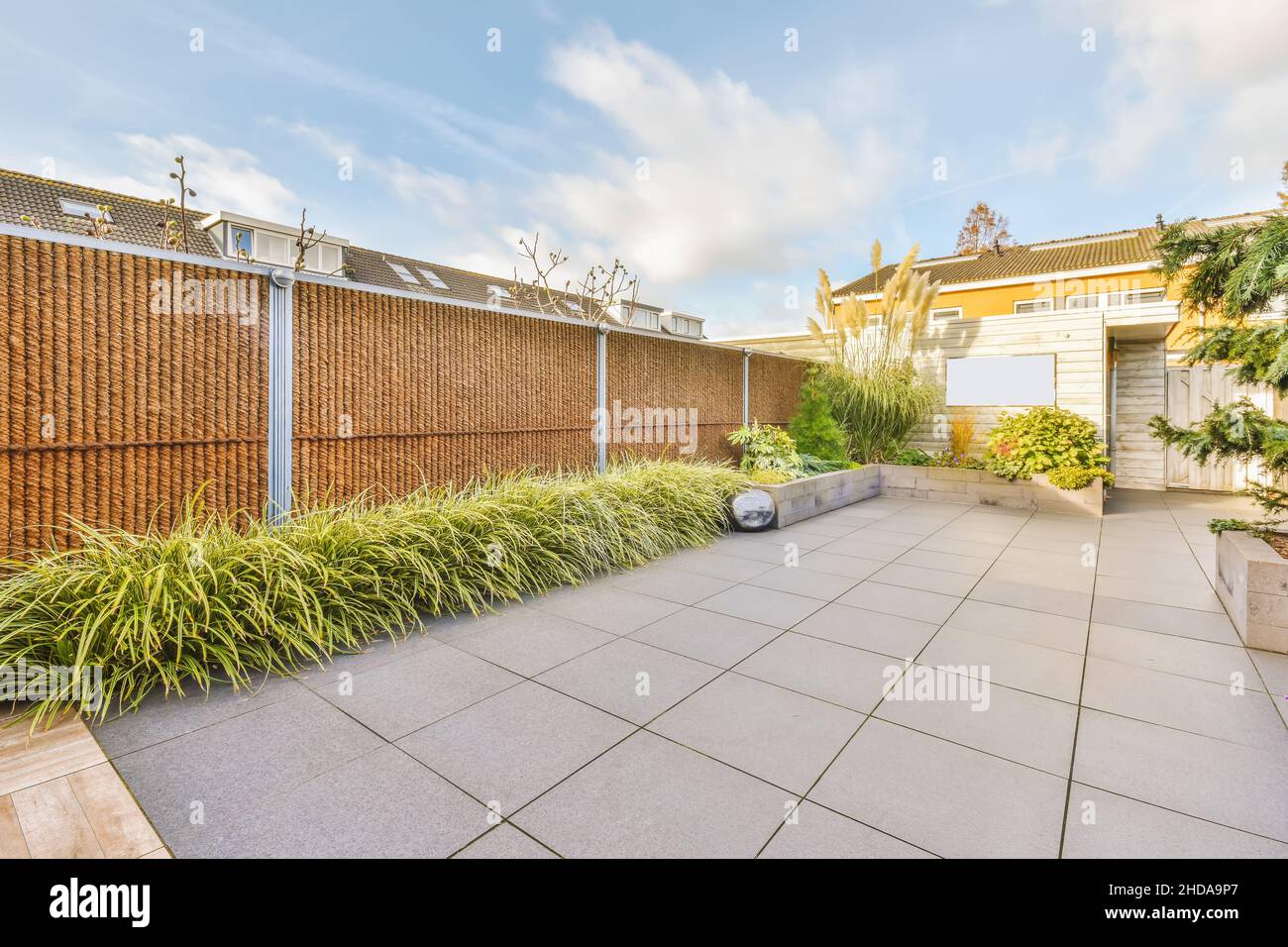 Superb courtyard with beautifully laid paths and greenery Stock Photo ...