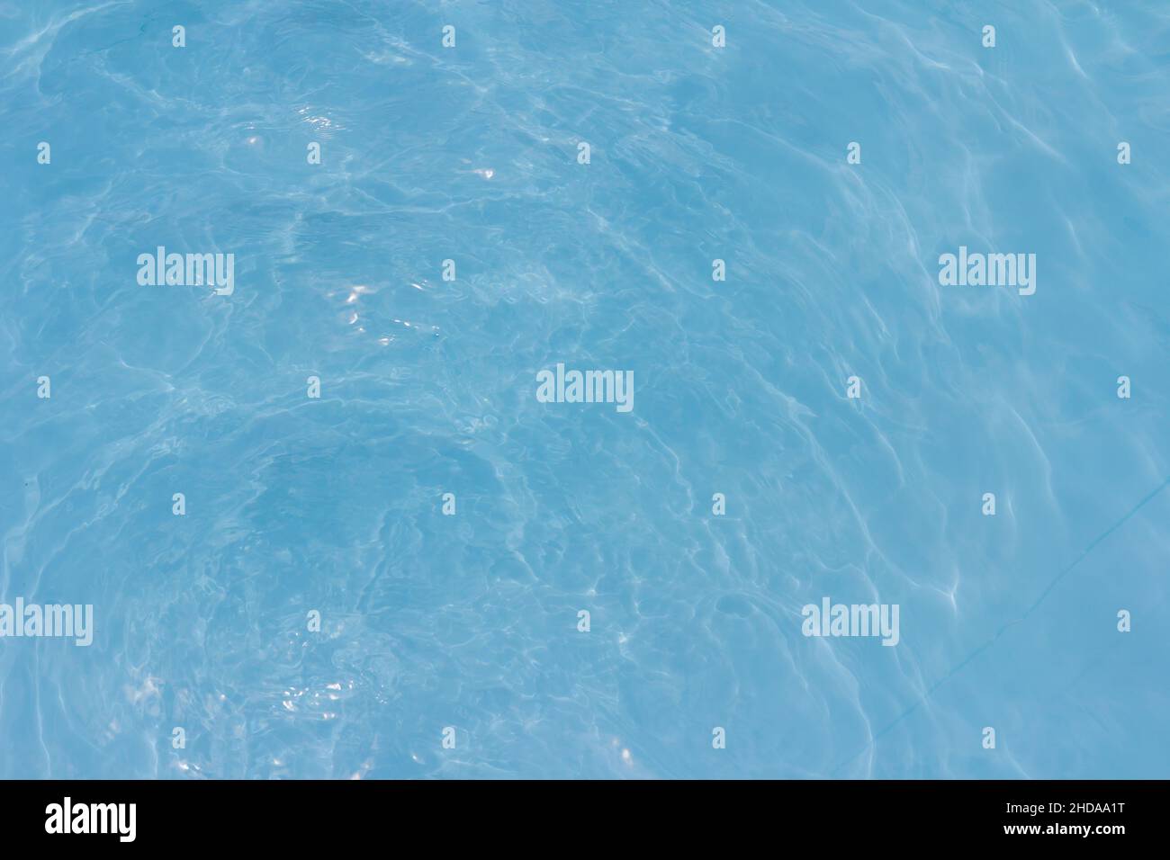 Blue pool water texture reflection background Stock Photo - Alamy