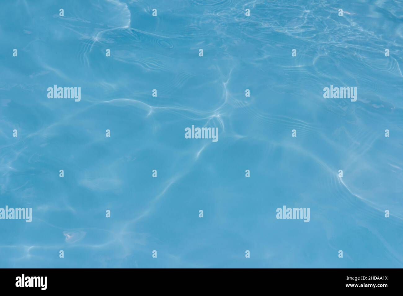 Blue pool water texture reflection background Stock Photo - Alamy
