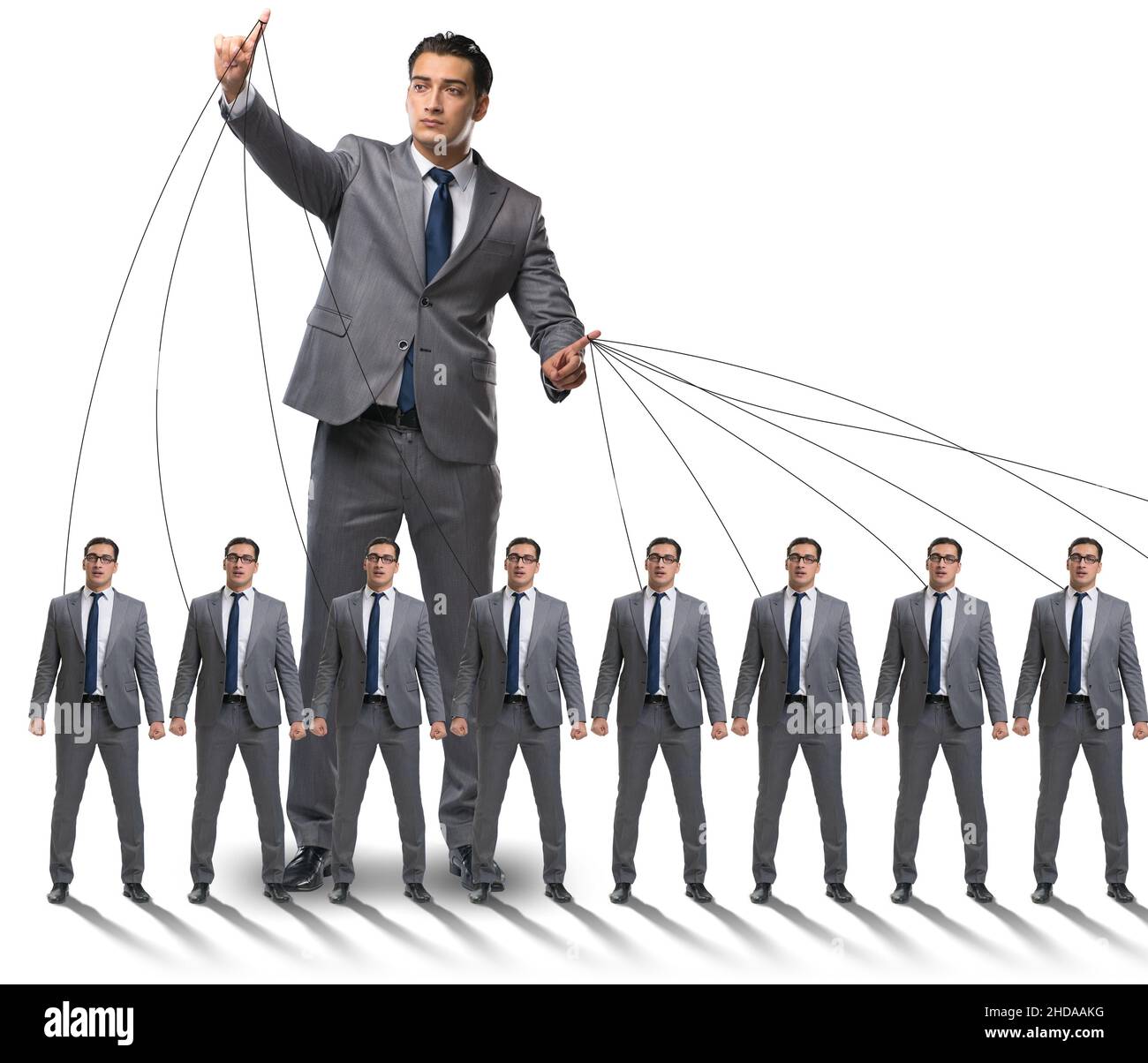 The boss employee manipulating his staff in business concept Stock ...