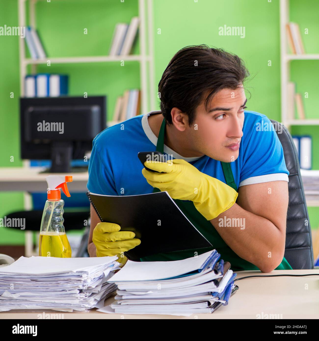 The male spy under cleaner cover stealing confidential documents Stock ...