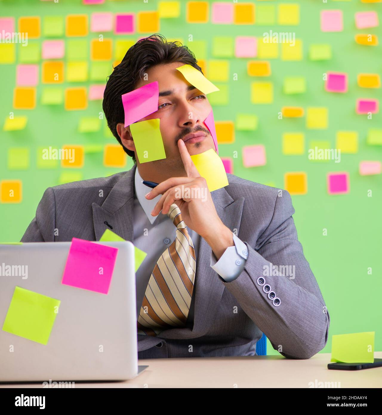 The businessman with many conflicting priorities Stock Photo - Alamy