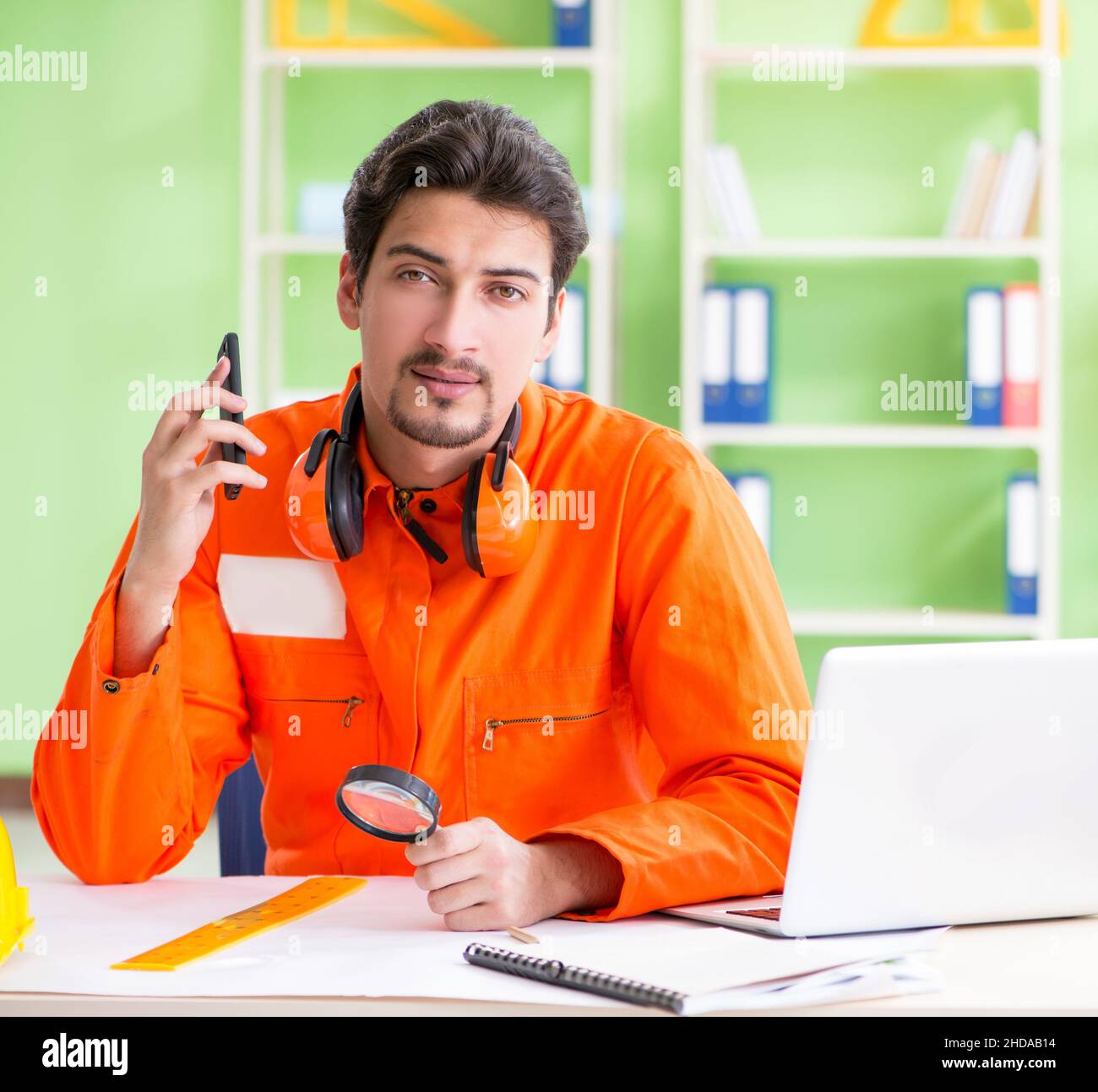 The construction supervisor planning new project in office Stock Photo ...