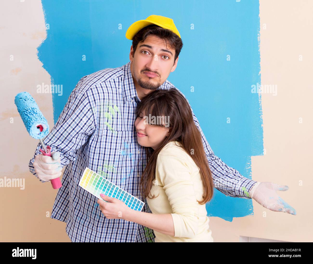 The husband and wife doing renovation at home Stock Photo - Alamy