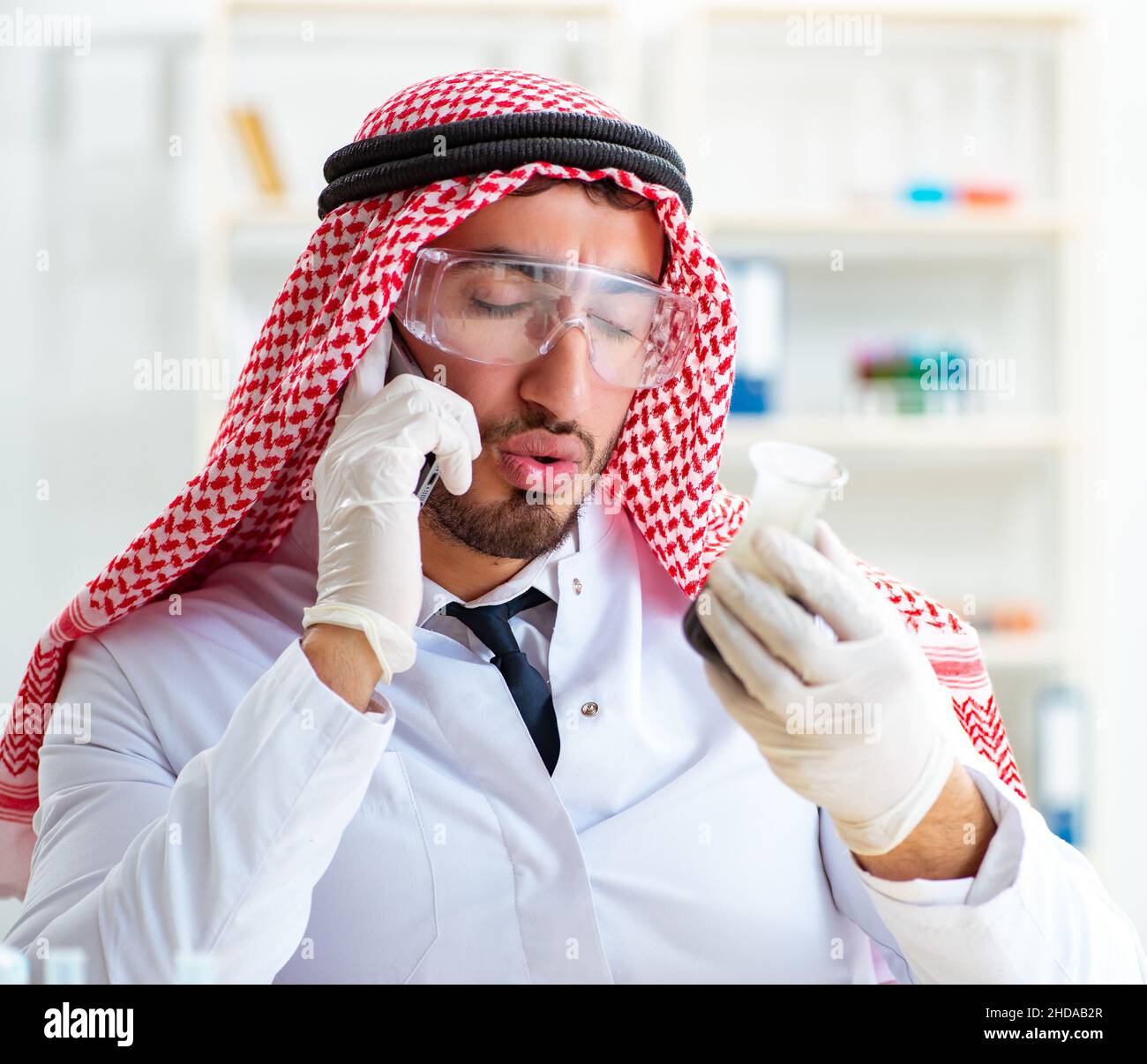The arab chemist scientist testing quality of oil petrol Stock Photo ...