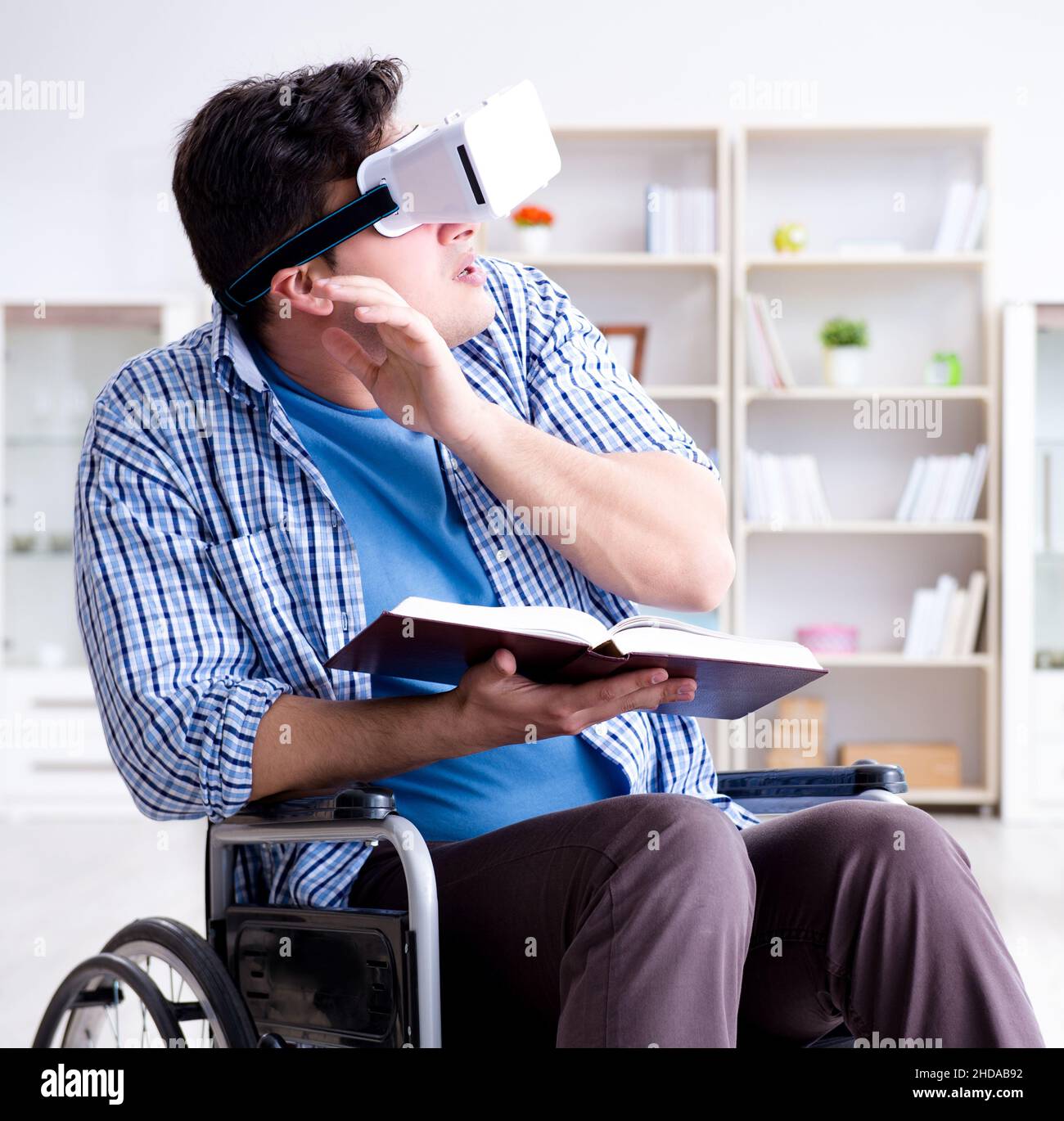 The disabled student studying with virtual reality glasses Stock Photo ...