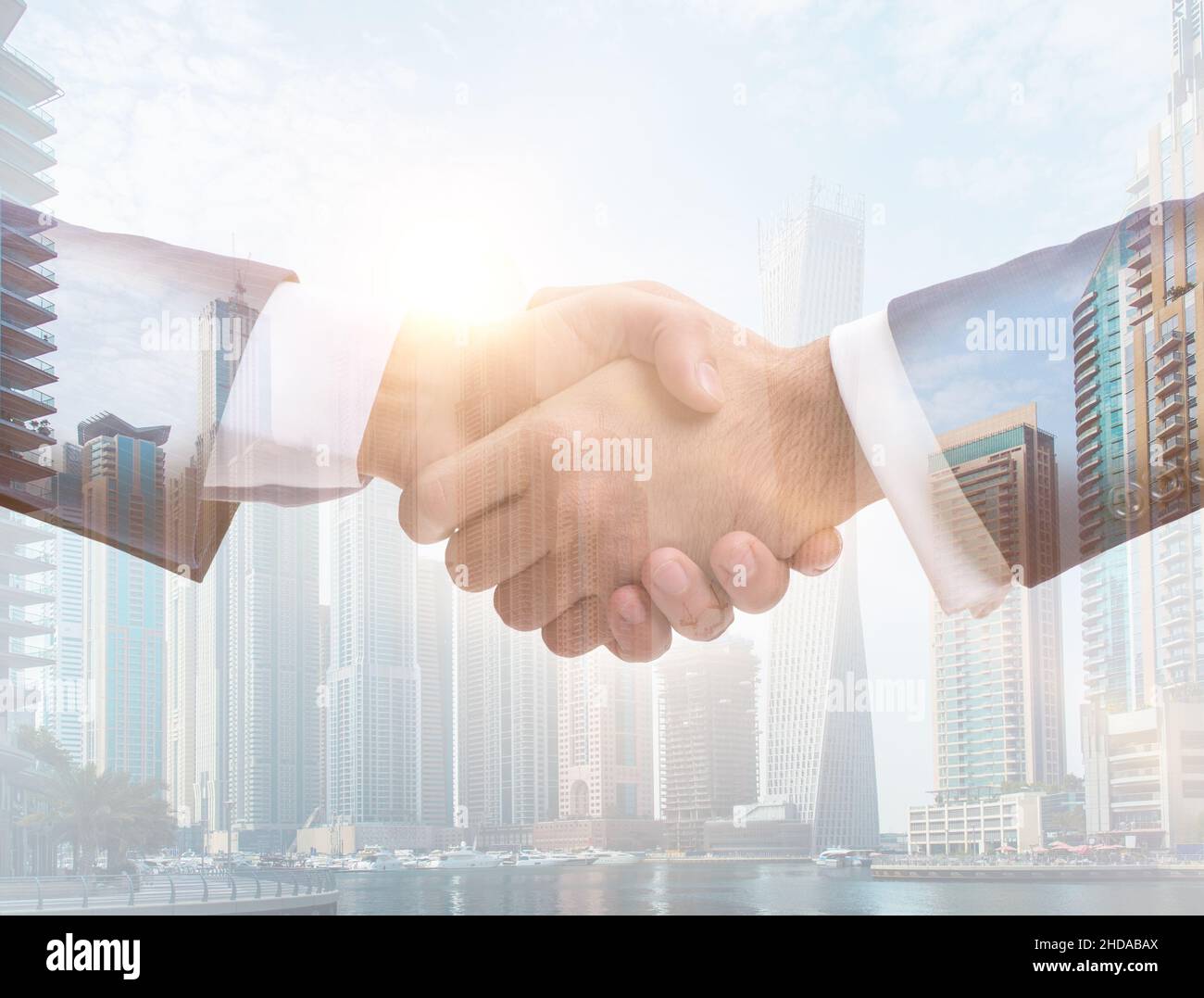 The concept of cooperation with handshake Stock Photo - Alamy