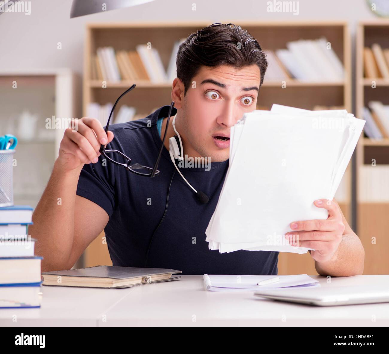 The angry man with too much paperwork to do Stock Photo - Alamy