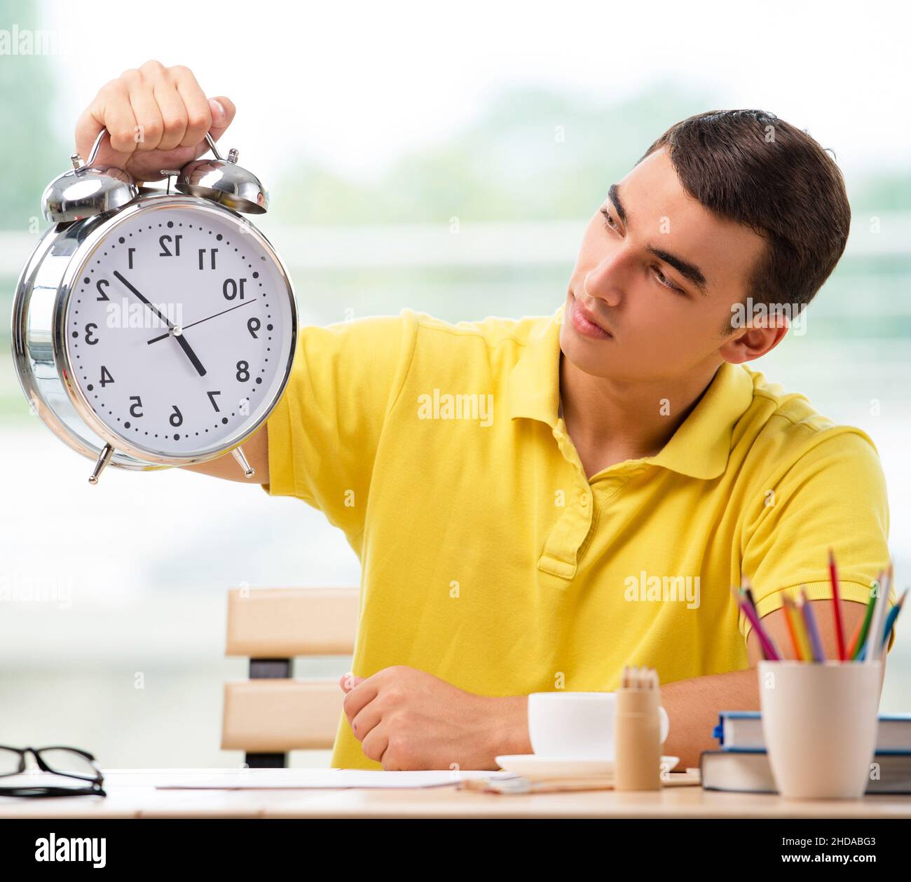 The student missing deadlines for exam preparation Stock Photo - Alamy