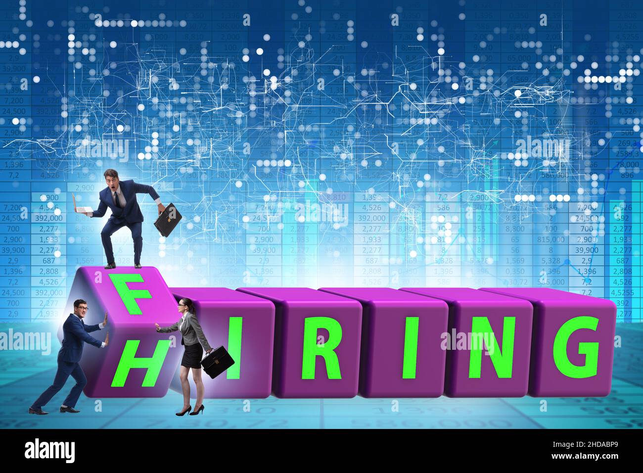 Hiring and firing concept with the turning cubes Stock Photo - Alamy