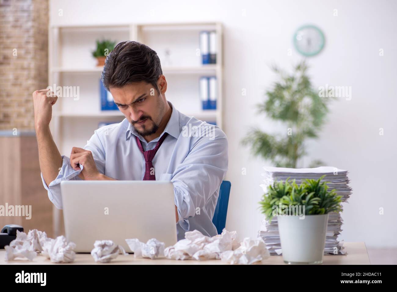 Young businessman employee in rejected ideas concept Stock Photo - Alamy