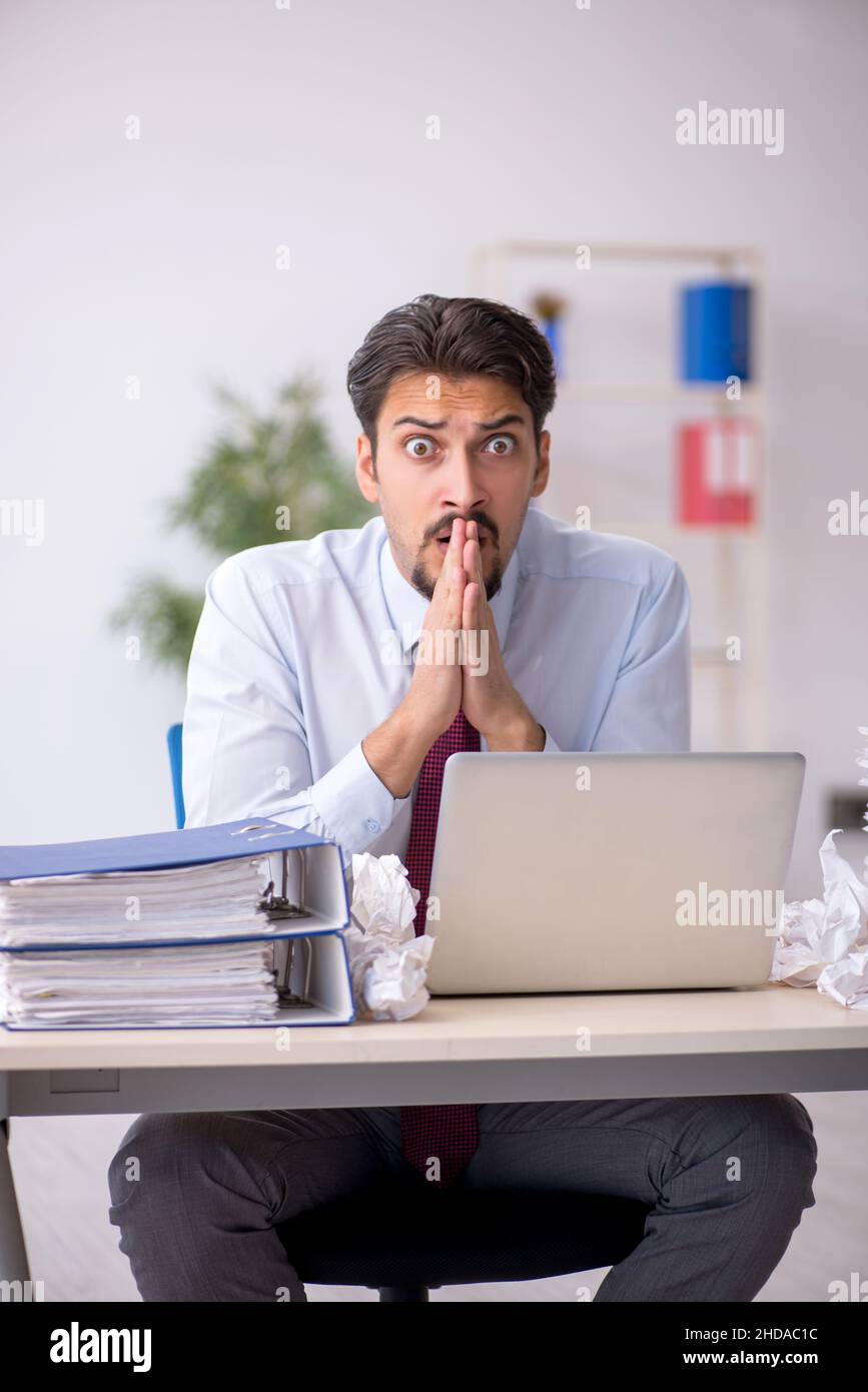 Young businessman employee in rejected ideas concept Stock Photo - Alamy