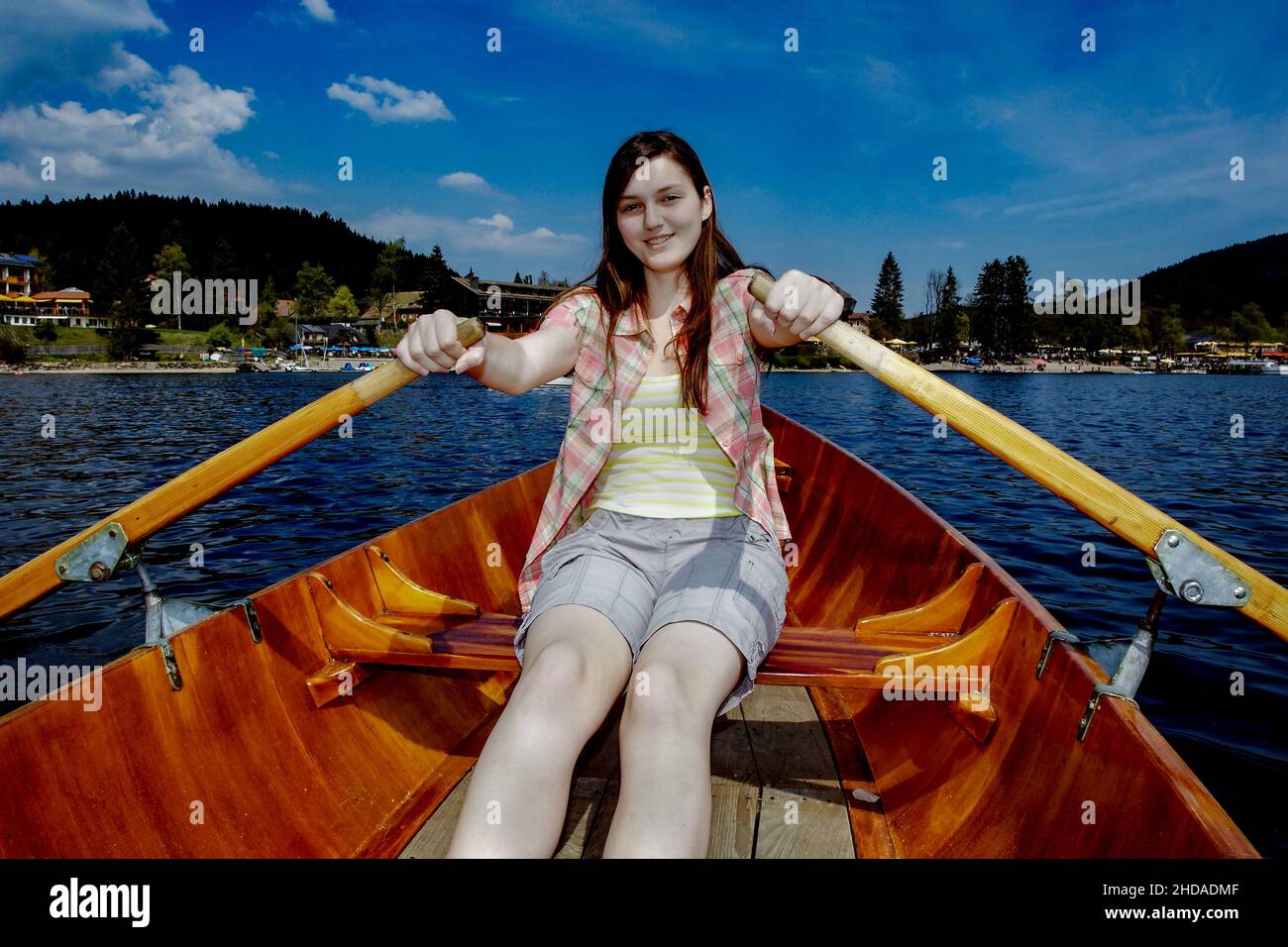 Sporty woman rowing boat hi-res stock photography and images - Alamy