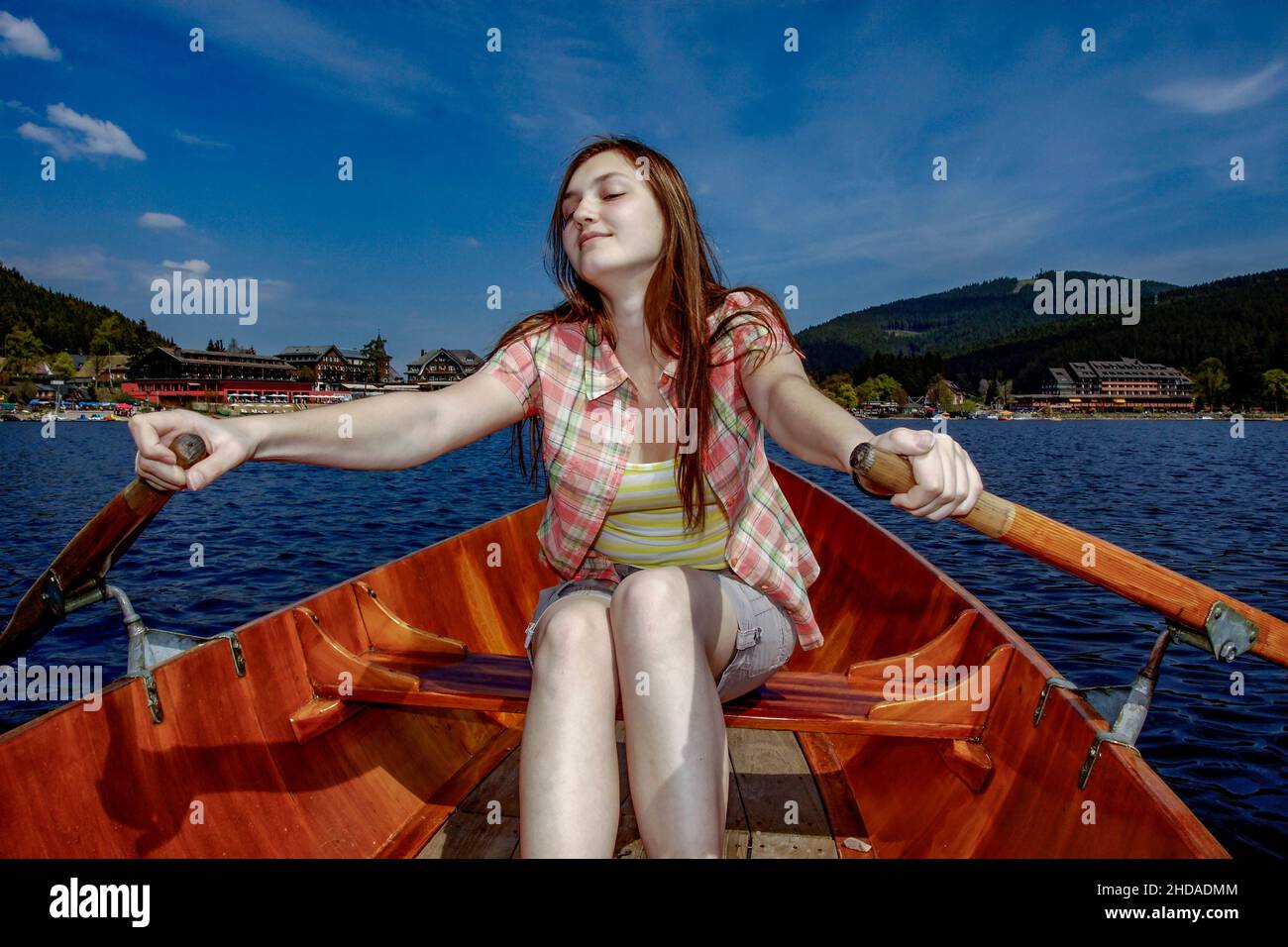 Woman in rowing boat hi-res stock photography and images - Alamy