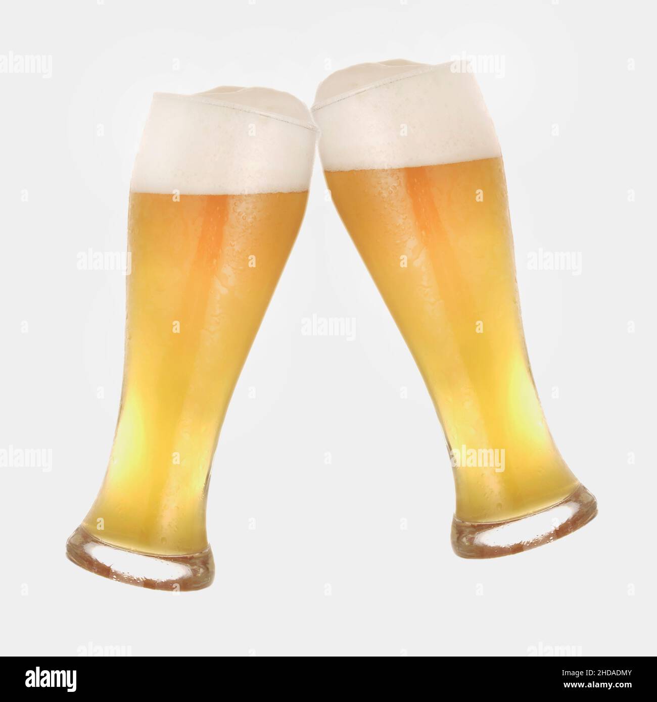 two wheat beer glasses toast each other Stock Photo - Alamy