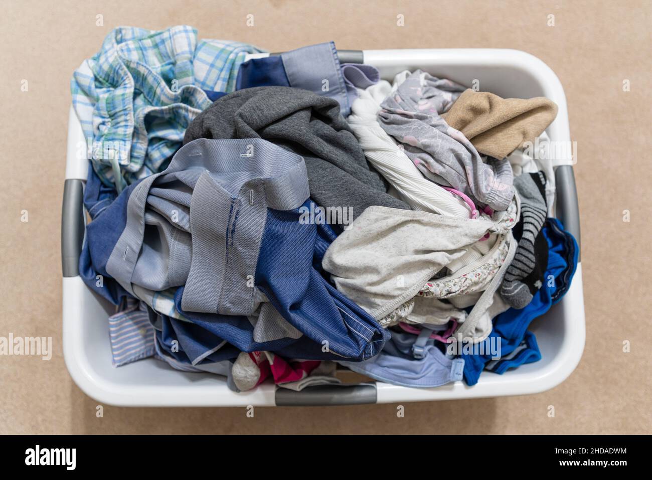 Laundry Basket with freshly washed clothes to dry Stock Photo - Alamy