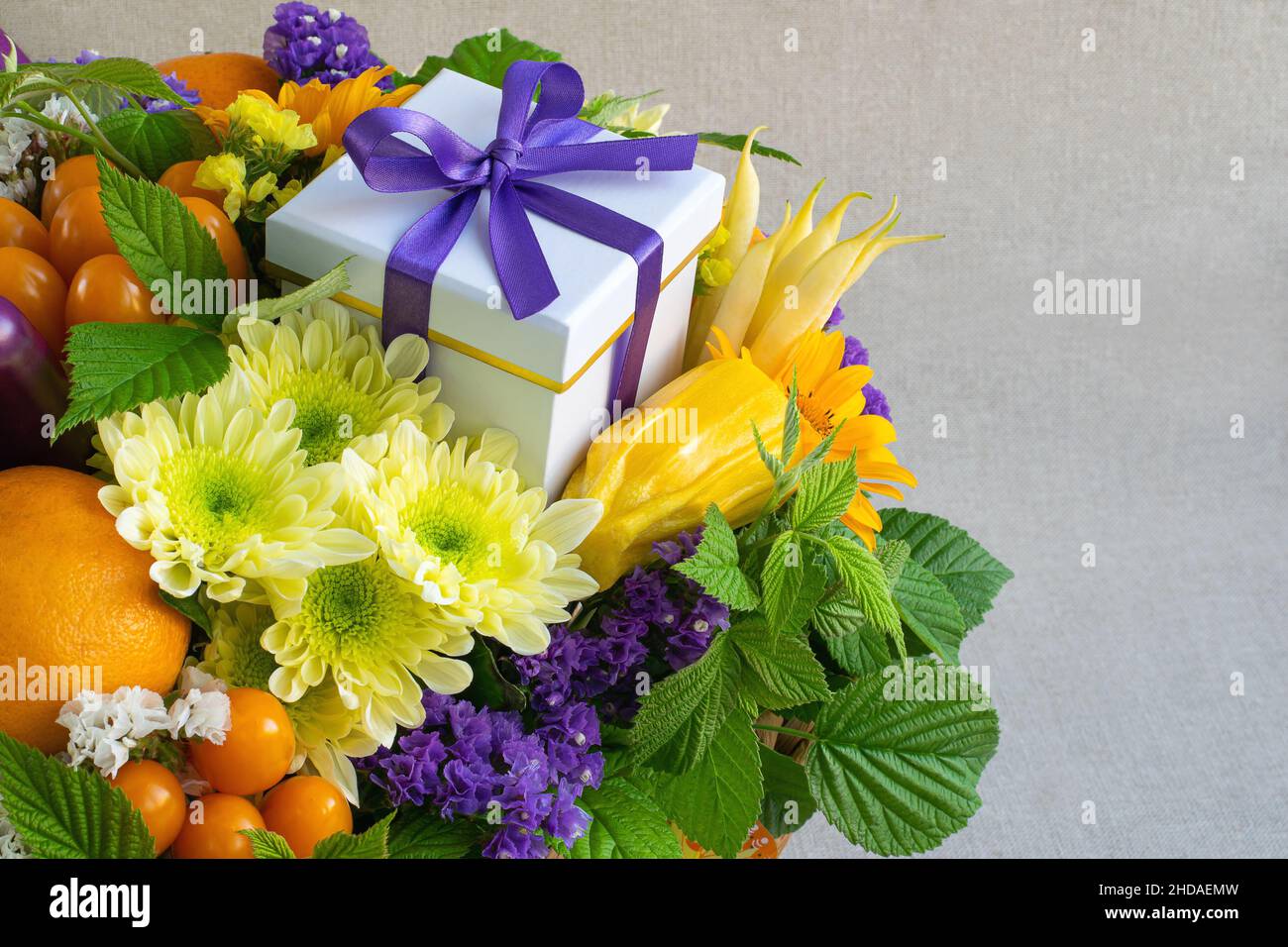 Bright composition of natural fruits, vegetables, flowers and greens on ...