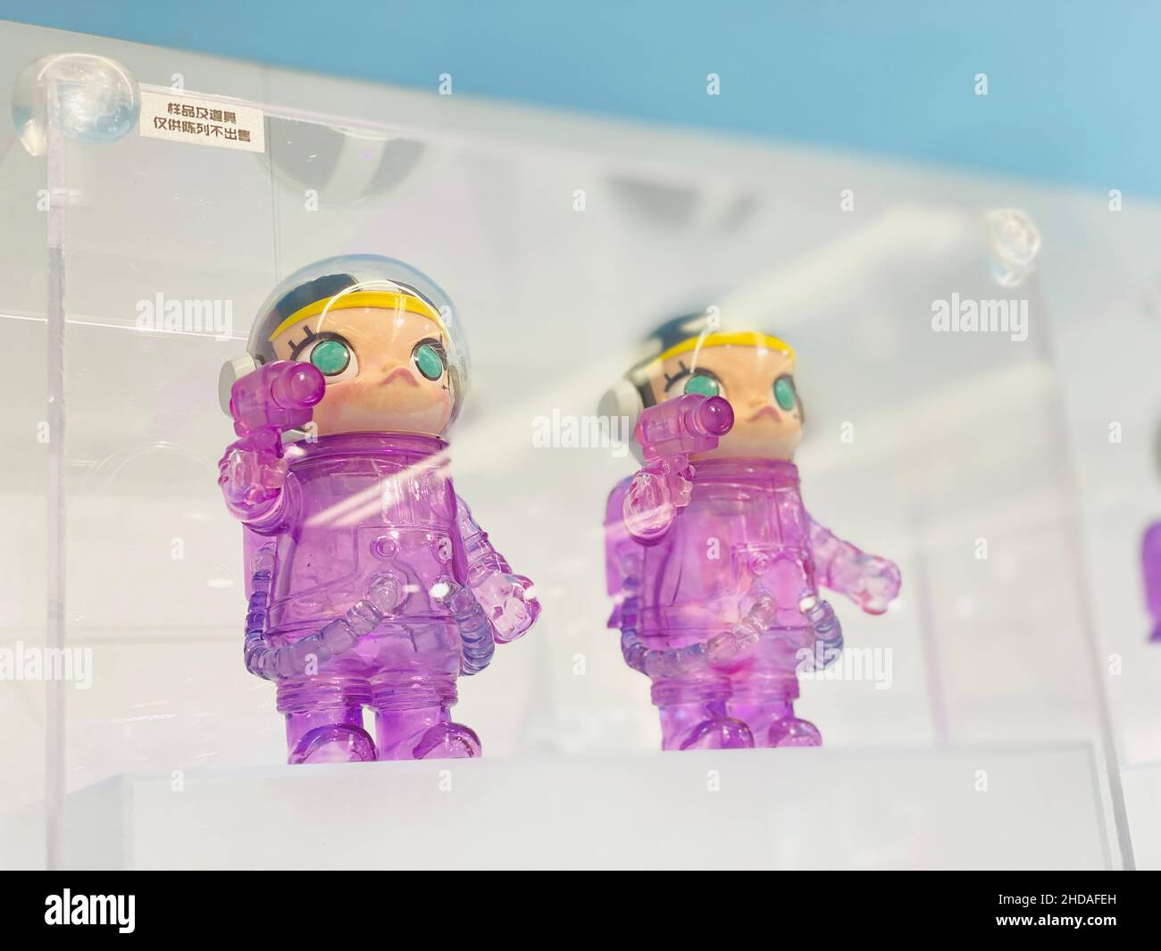 Closeup shot of two cool futuristic dolls in plastic packaging Stock ...