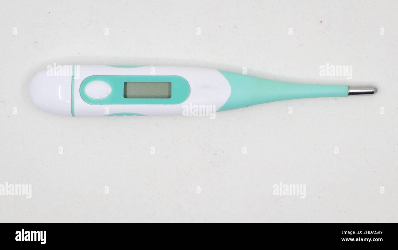 a simple and plain digital thermometer with blank reading kept laying ...
