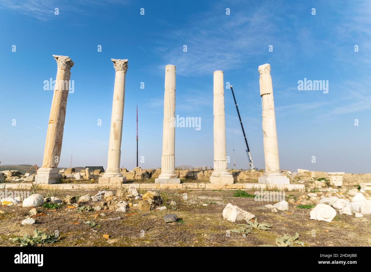 Unique and original pillars standing rebuilt with cranes in the ...
