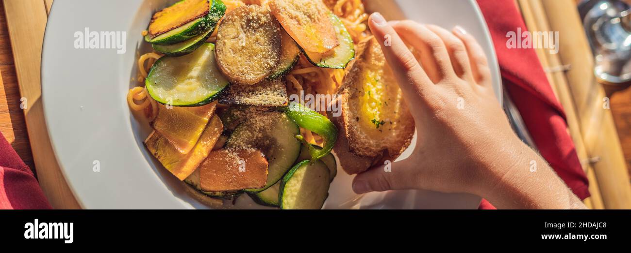 Pasta with fried vegetables and garlic bread BANNER, long format Stock ...