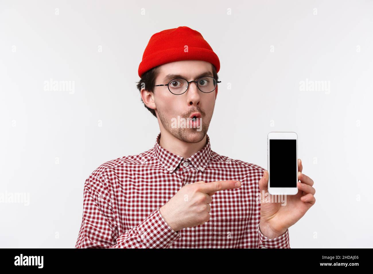 Technology and people concept. Close-up portrait fascinated and ...