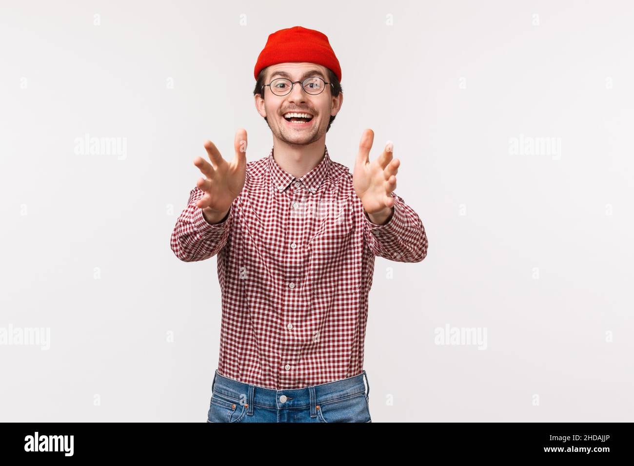 Waist-up portrait happy smiling caucasian man reaching something, raise ...