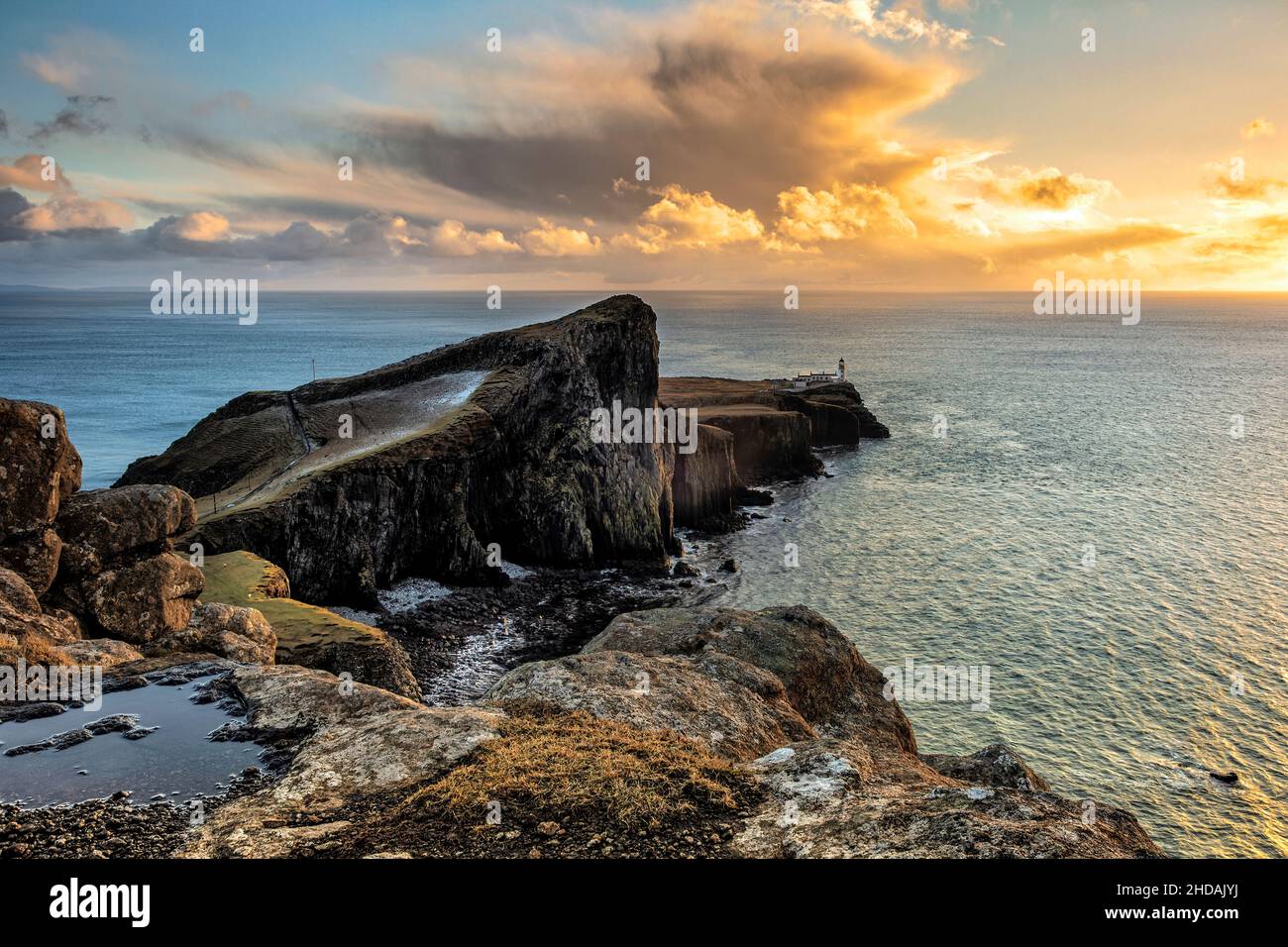 Scenic view of the Neist Point Lighthouse in Scotland on a bright ...