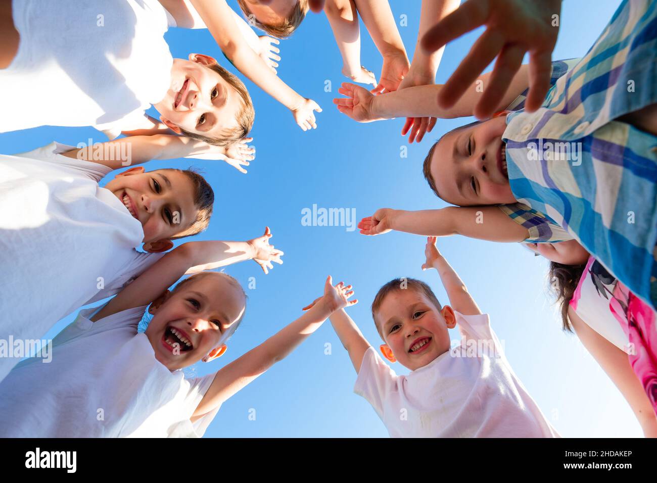 children play outdoors with a large company Stock Photo - Alamy