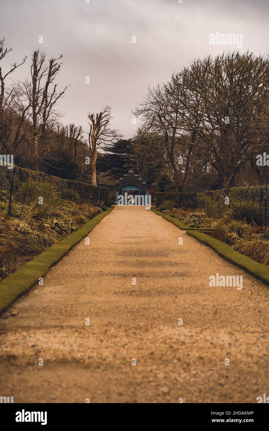 Pathway leading to a gate hi-res stock photography and images - Alamy