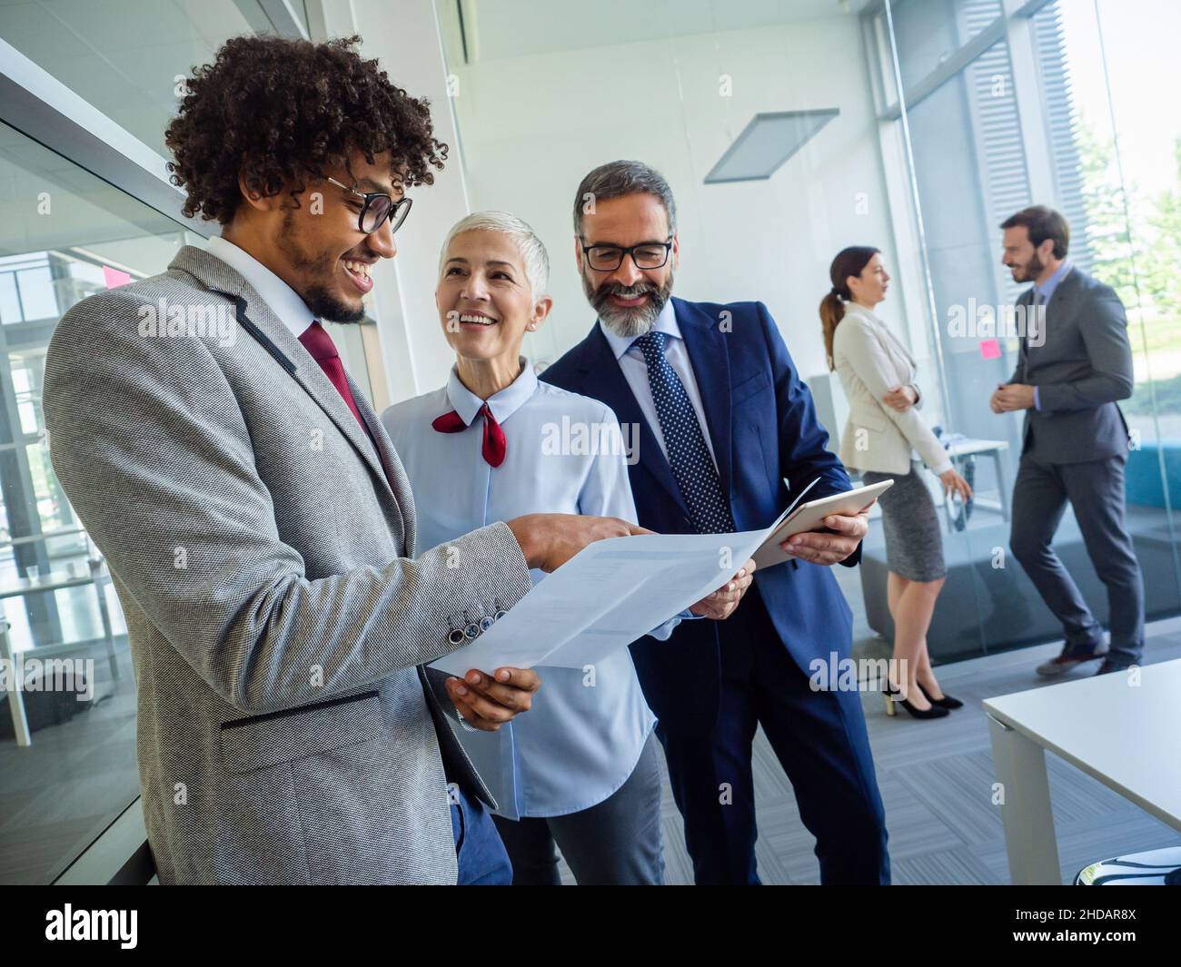 Corporate business team and manager in a meeting Stock Photo - Alamy