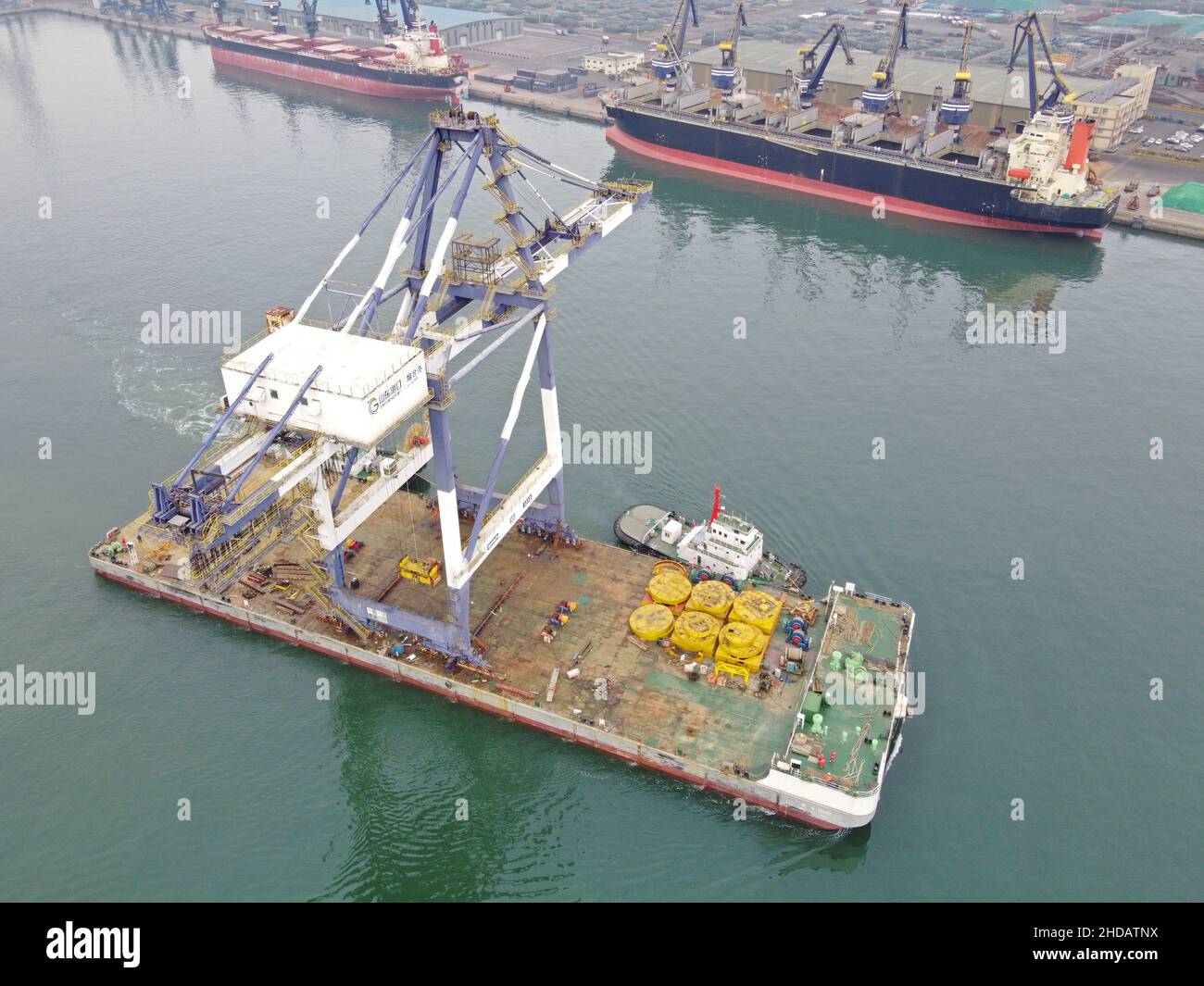 YANTAI, CHINA - JANUARY 5, 2022 - A decked barge "Defu 15002" carries ...
