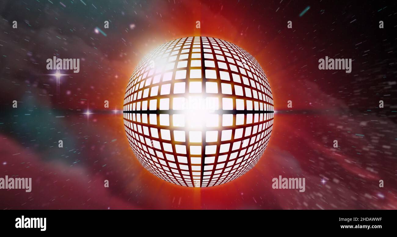 Image of revolving disco ball over stars and colourful lights Stock ...