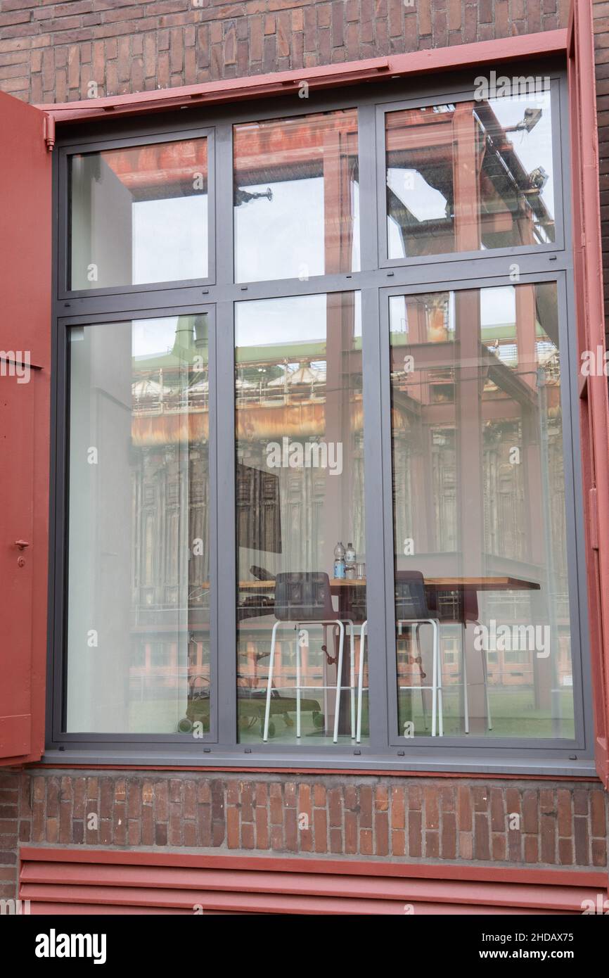 Office from outside through window Stock Photo - Alamy