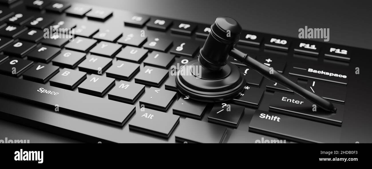 Online auction, cyber crime, law and technology concept. Judge gavel on black computer keyboard ...