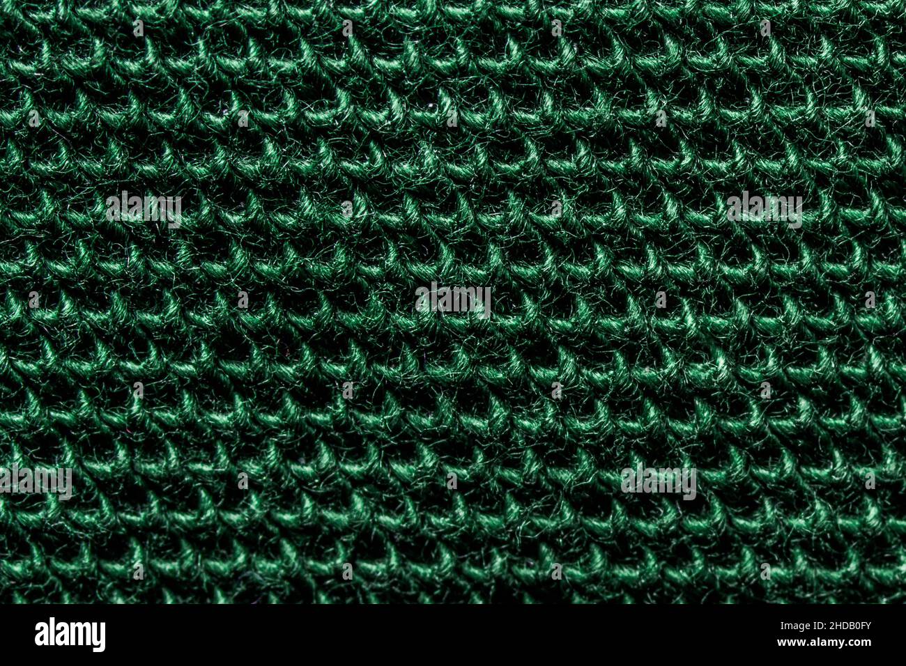 Green background net with a pattern, scaffolding cover. Constructions ...