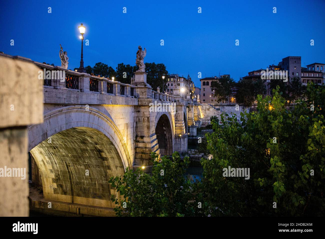 rome bridge over tiber at night Stock Photo - Alamy