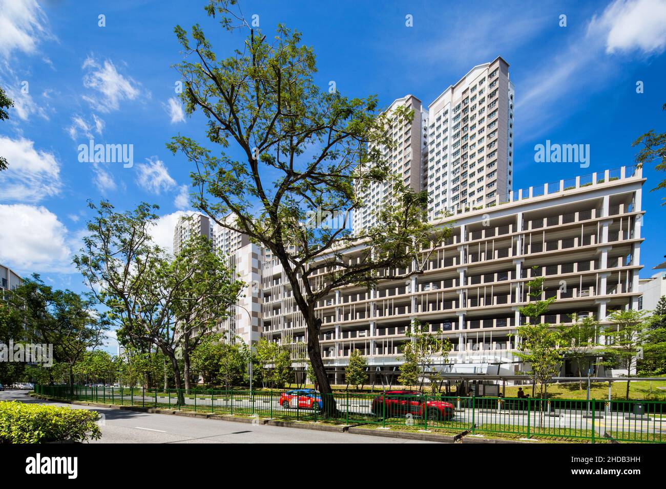 A side view of local housing design, good weather with blue cloudy sky ...
