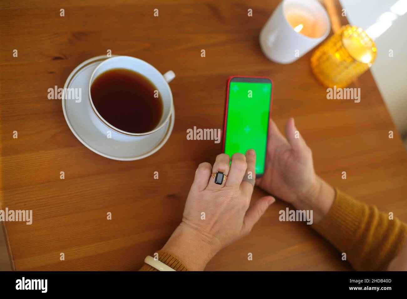 Woman drinking tea green screen hi-res stock photography and images - Alamy