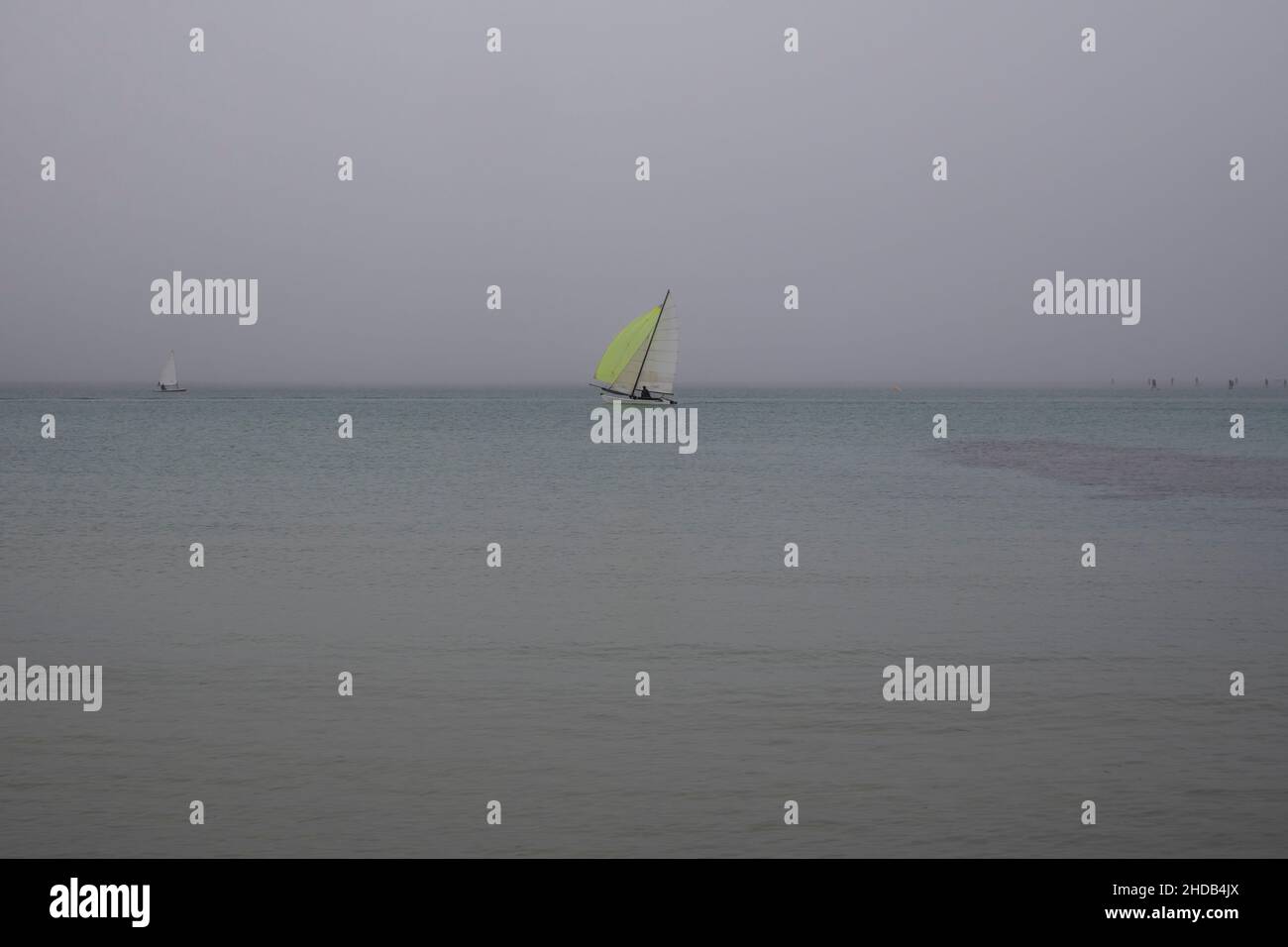 Scene banner of sailing and dream boats in the mist at dawn in the calm ...