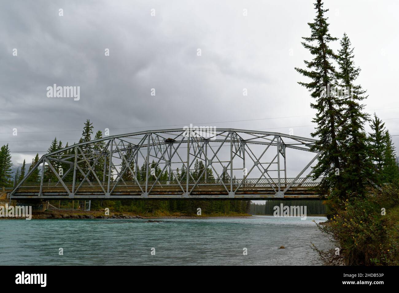 A bridge crosses Bow River in Banff National Park, Canada Stock Photo ...