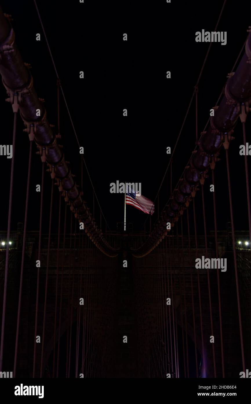 The Brooklyn Bridge proudly flying it's flag Stock Photo - Alamy