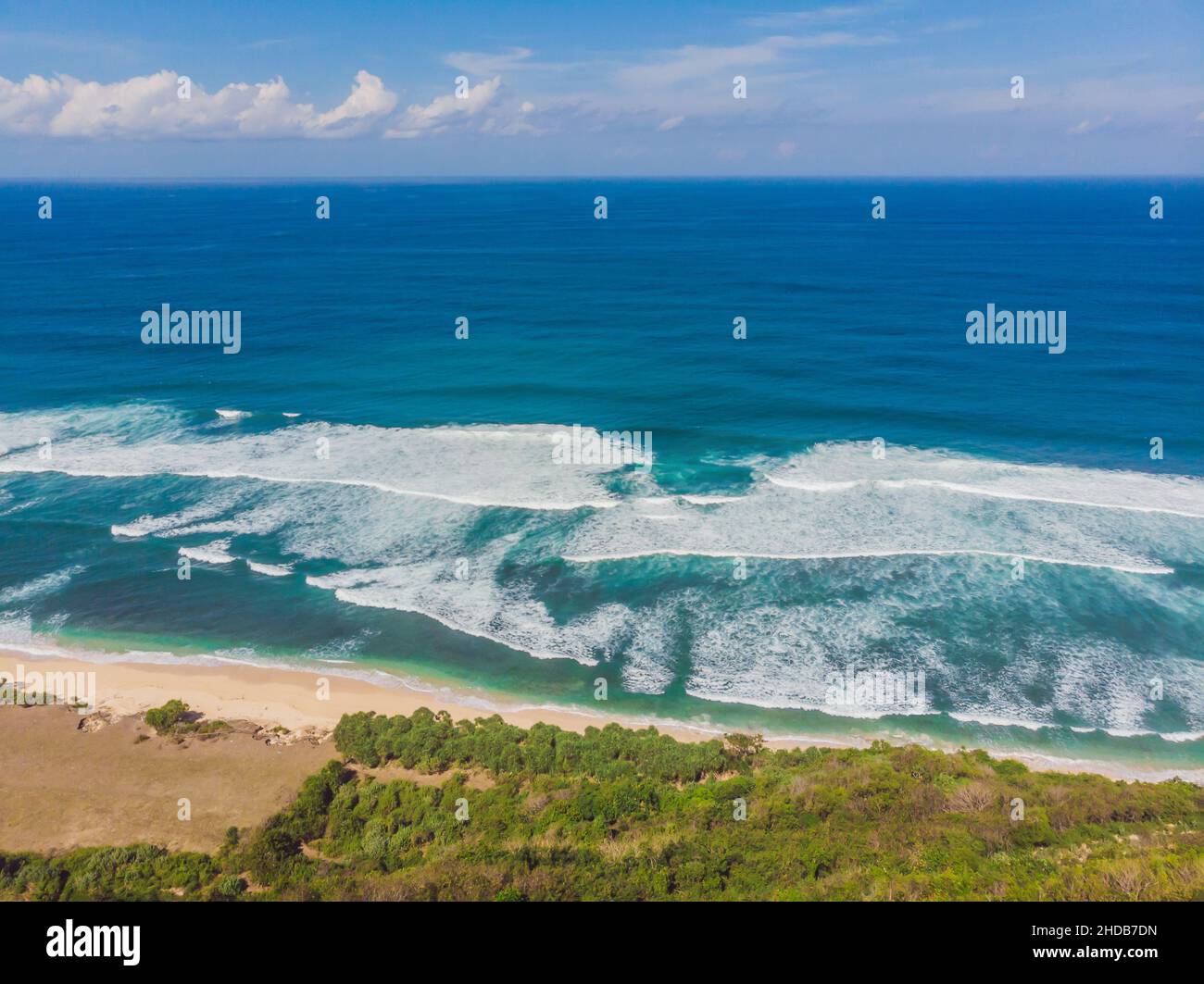 Top aerial view of beauty Bali beach. Empty paradise beach, blue sea ...