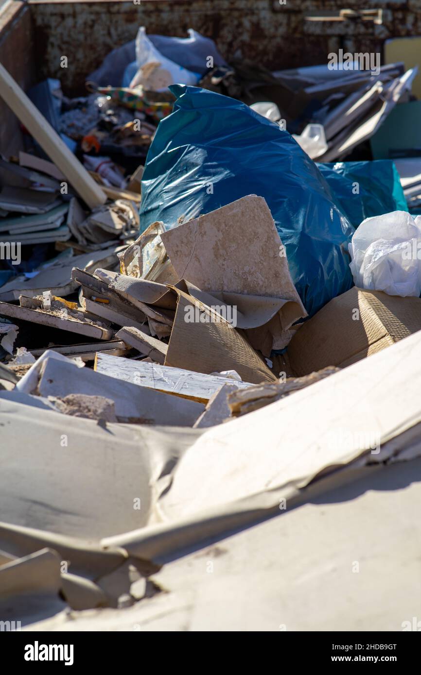 View at inside of a trash dumpster full of waste of restorateion and ...