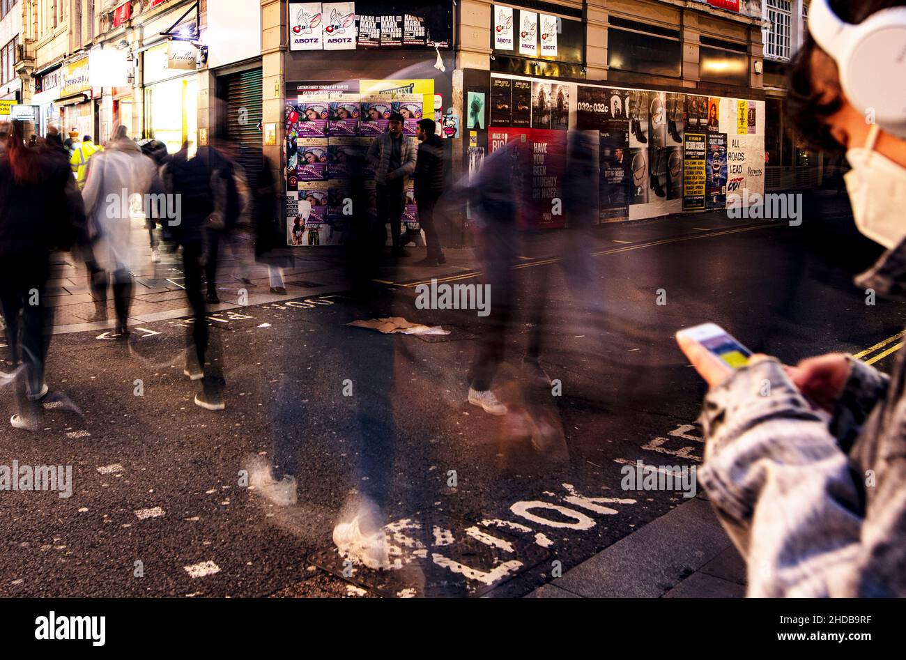 Oxford Street at dusk; a busy shopping street in central London, long ...