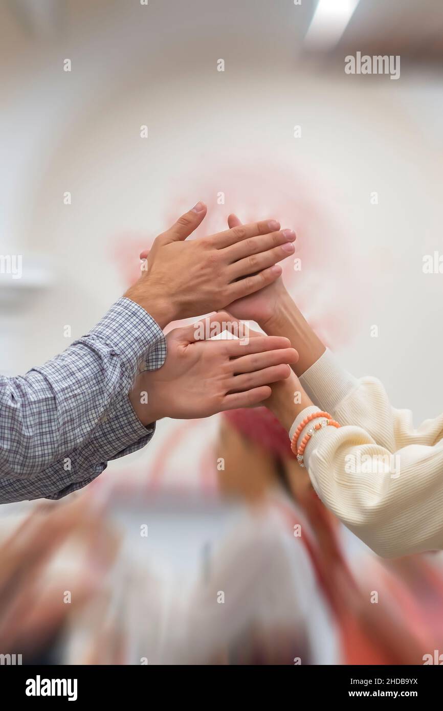 interlacing of hands, palms of a man and a woman in Russian national ...
