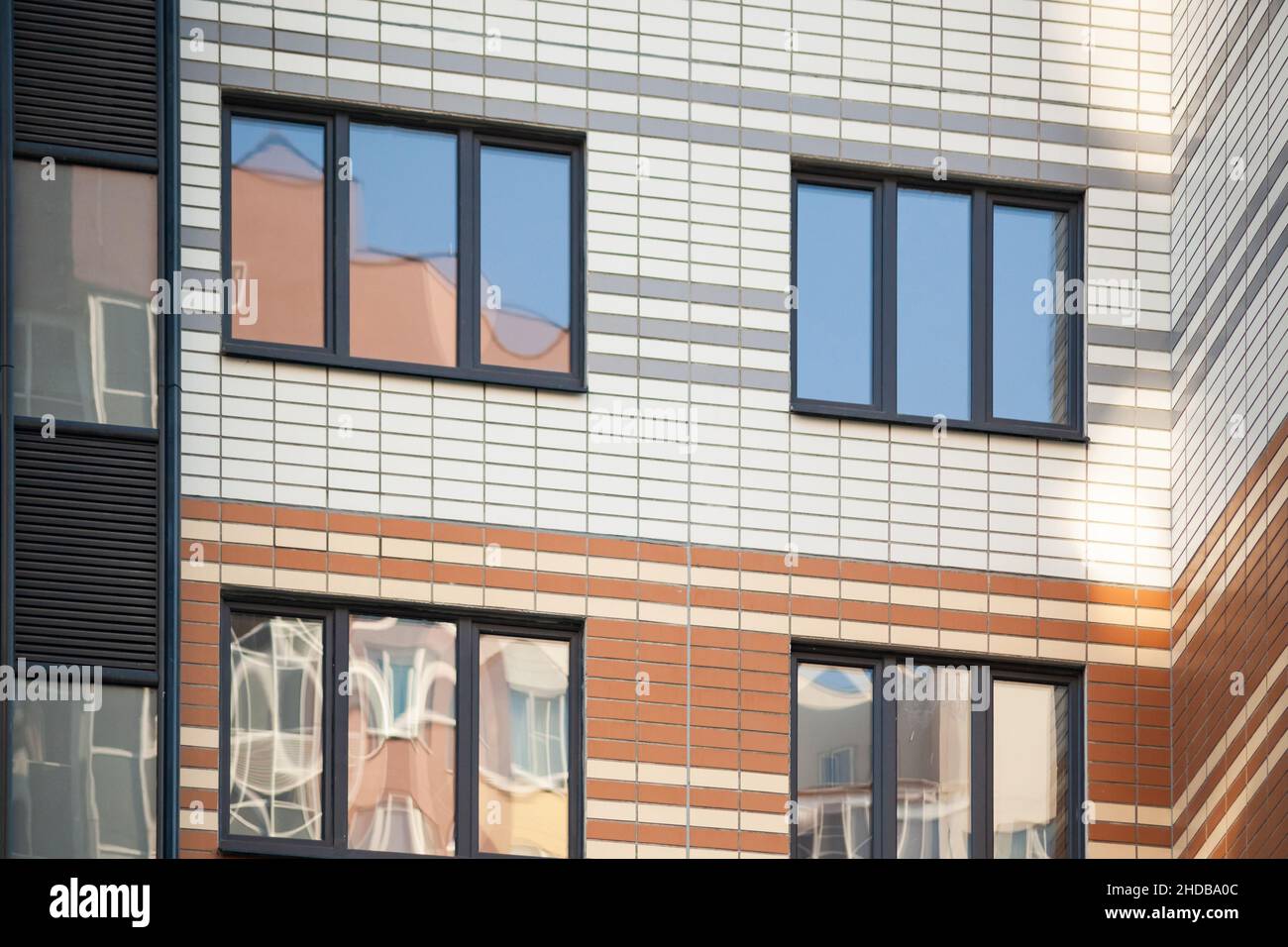 laminated plastic windows on the facade of apartment buildings Stock ...