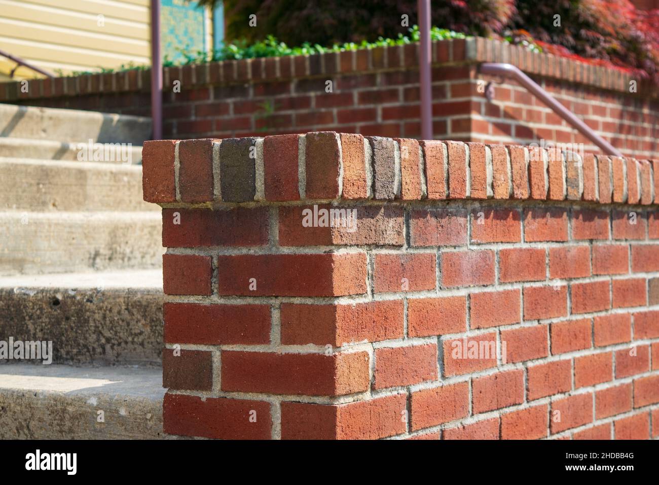 Half brick wall in a classic architectural style Stock Photo - Alamy