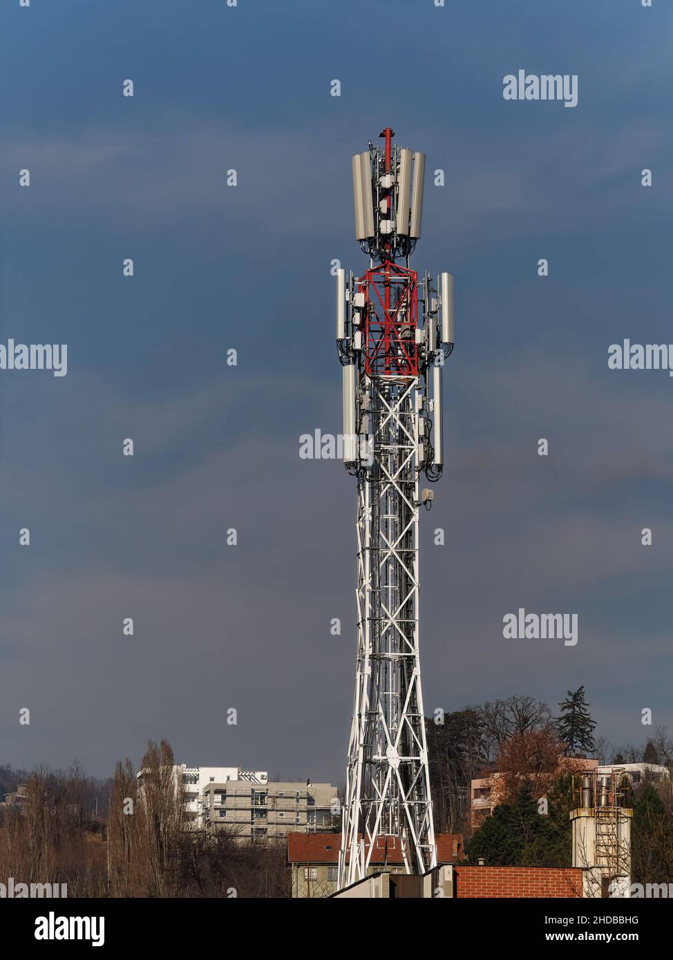 Picture of a communication tower on top of the roof of the building ...