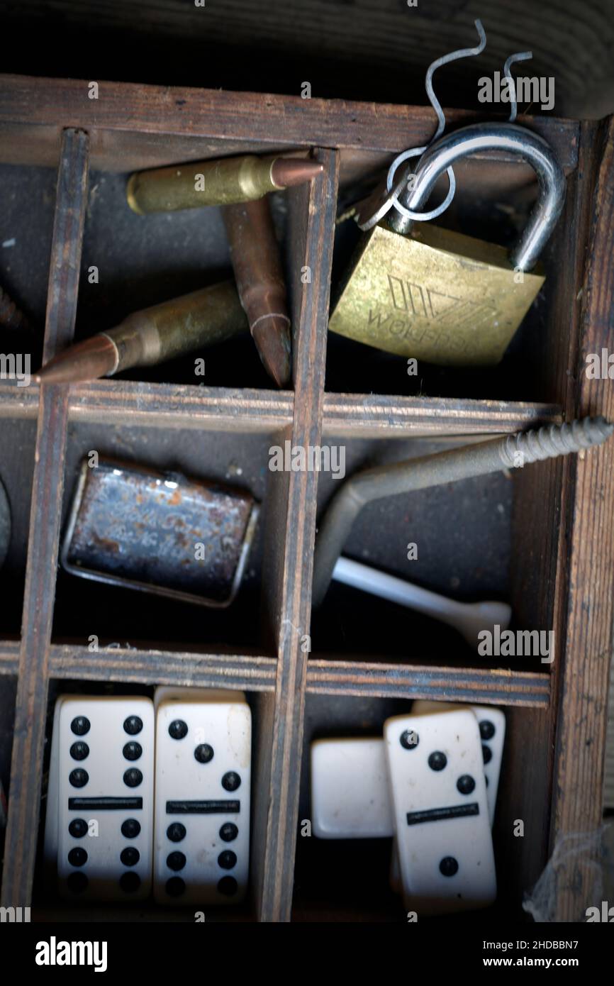 wooden box full of bric a brac Stock Photo - Alamy